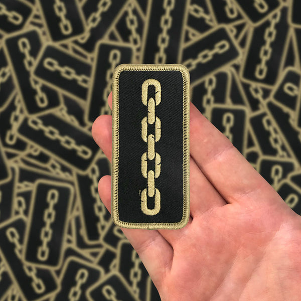 "Chains Gold" Patch by Matthew Johnson - Hero Complex Gallery