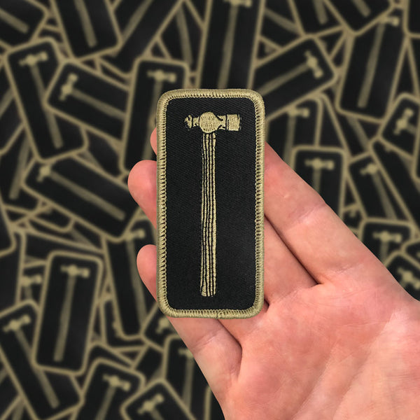 "Ball Peen Hammer Gold" Patch by Matthew Johnson - Hero Complex Gallery